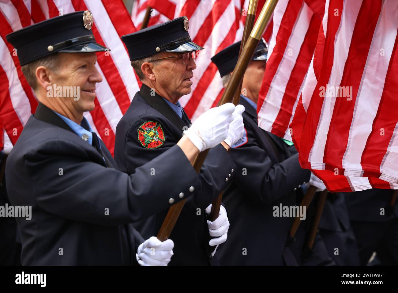 Members of the FDNY Color Guard march in the St. Patrick's Day Parade ...