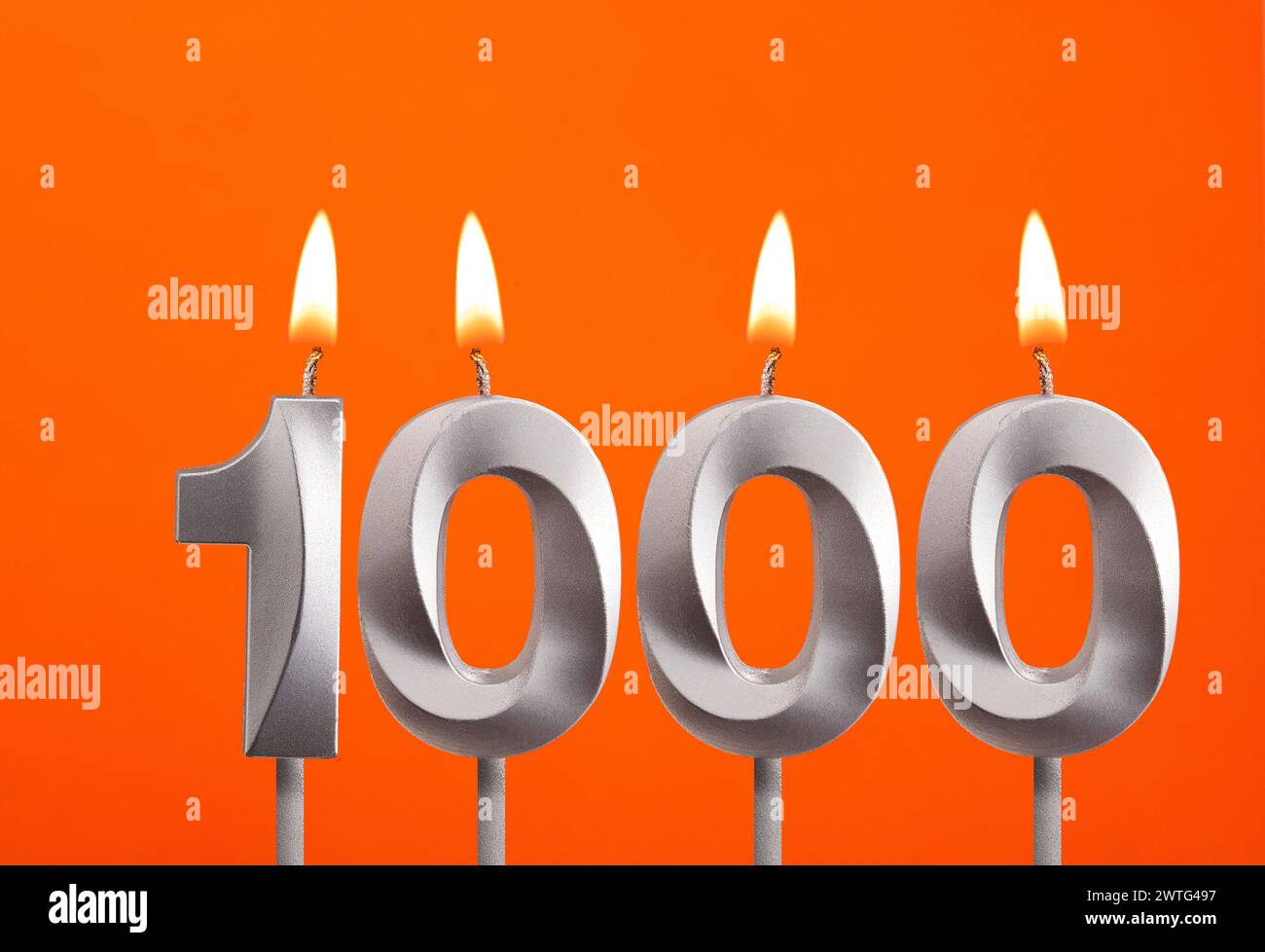 Number of followers or likes - Candle number 1000 Stock Photo - Alamy