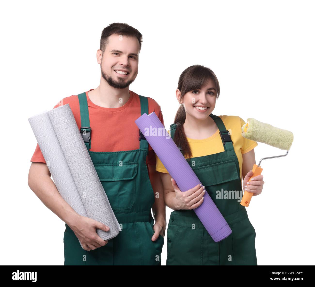Workers with wallpaper rolls and roller on white background Stock Photo ...