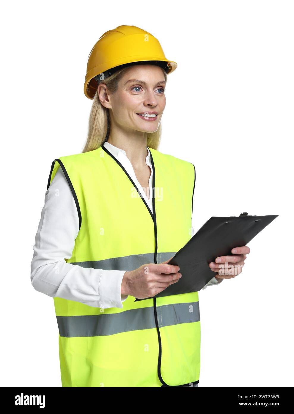 Engineer in hard hat holding clipboard on white background Stock Photo ...