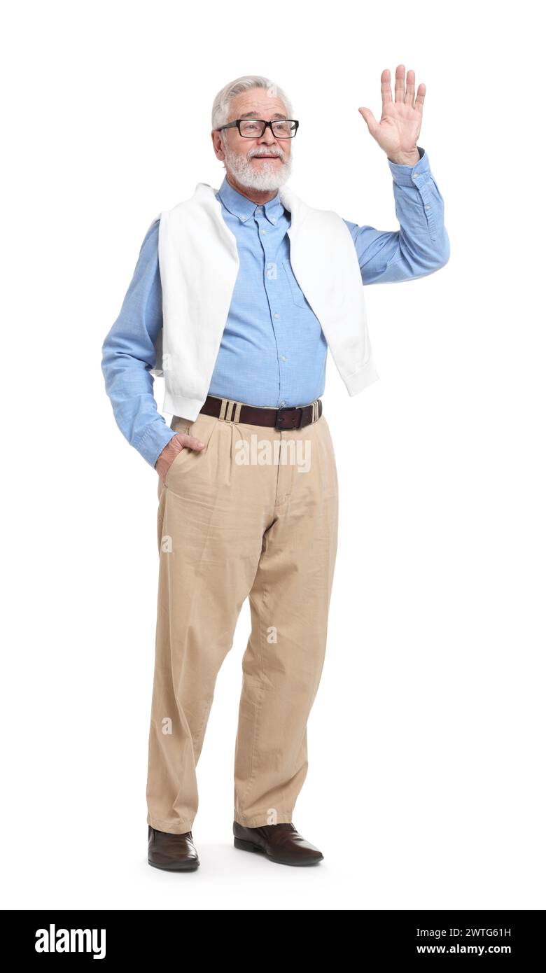 Senior man waving hand on white background Stock Photo - Alamy