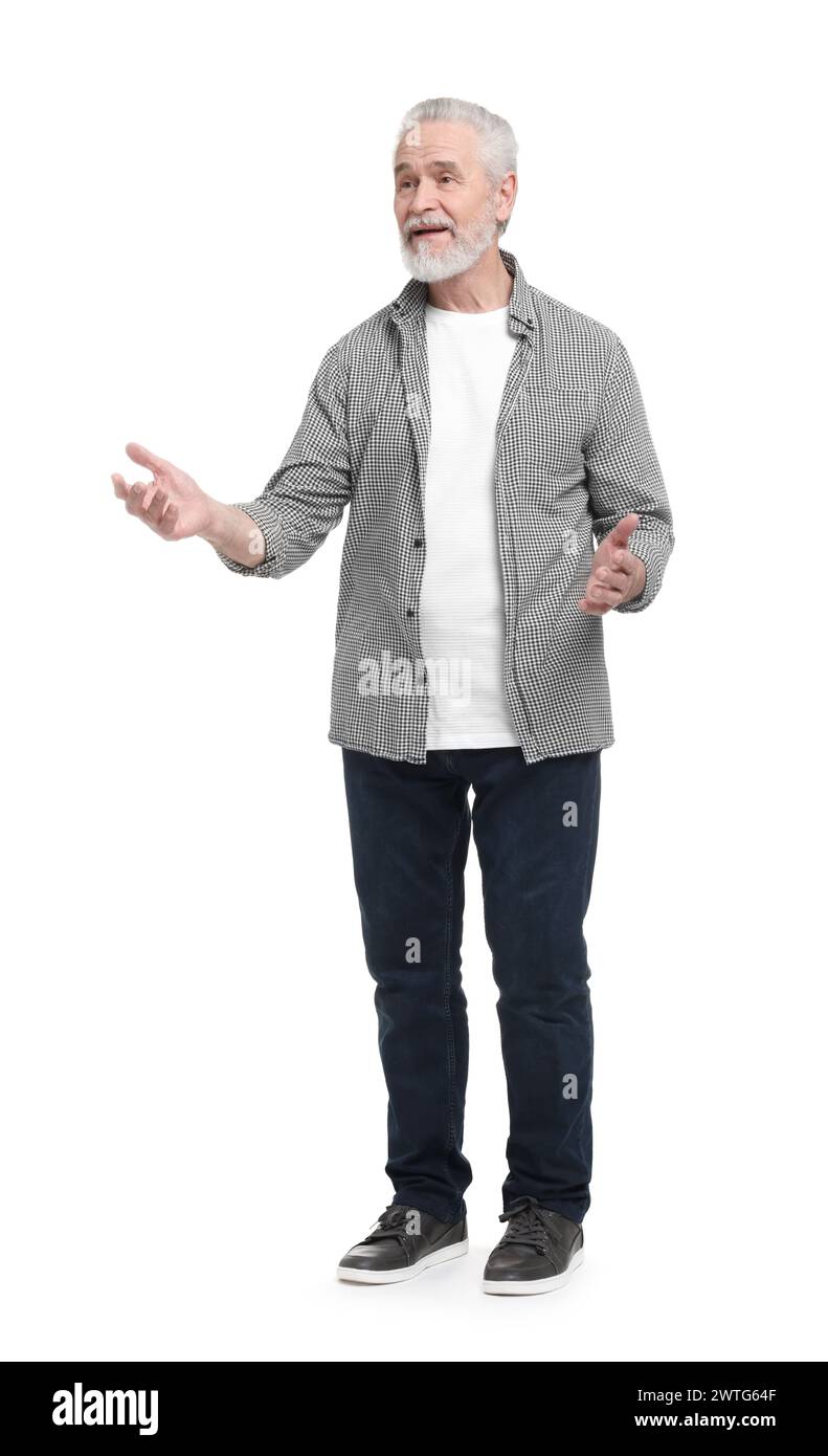 Senior man greeting someone on white background Stock Photo - Alamy