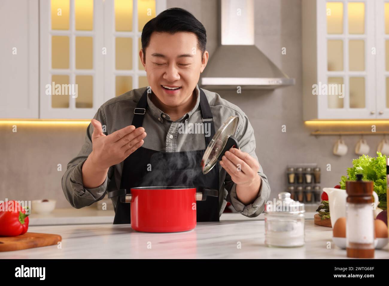 Smelling food cooking hi-res stock photography and images - Alamy