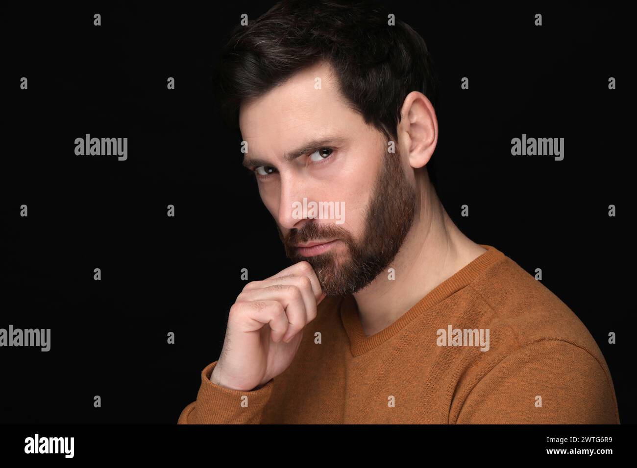 Evil eye. Man with scary eyes on black background Stock Photo - Alamy