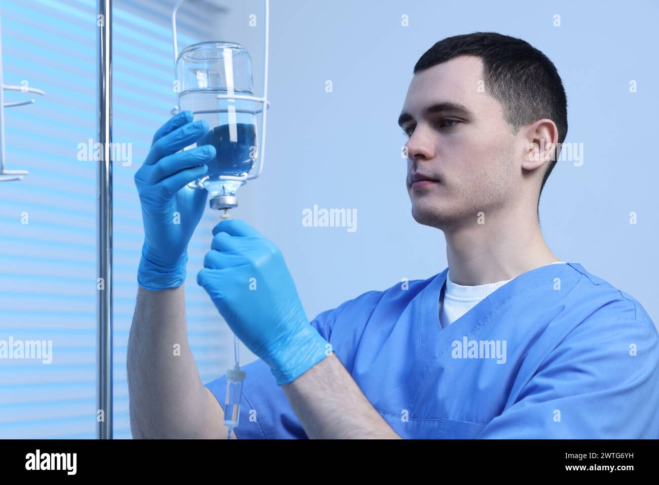 Nurse drip stand hi-res stock photography and images - Alamy