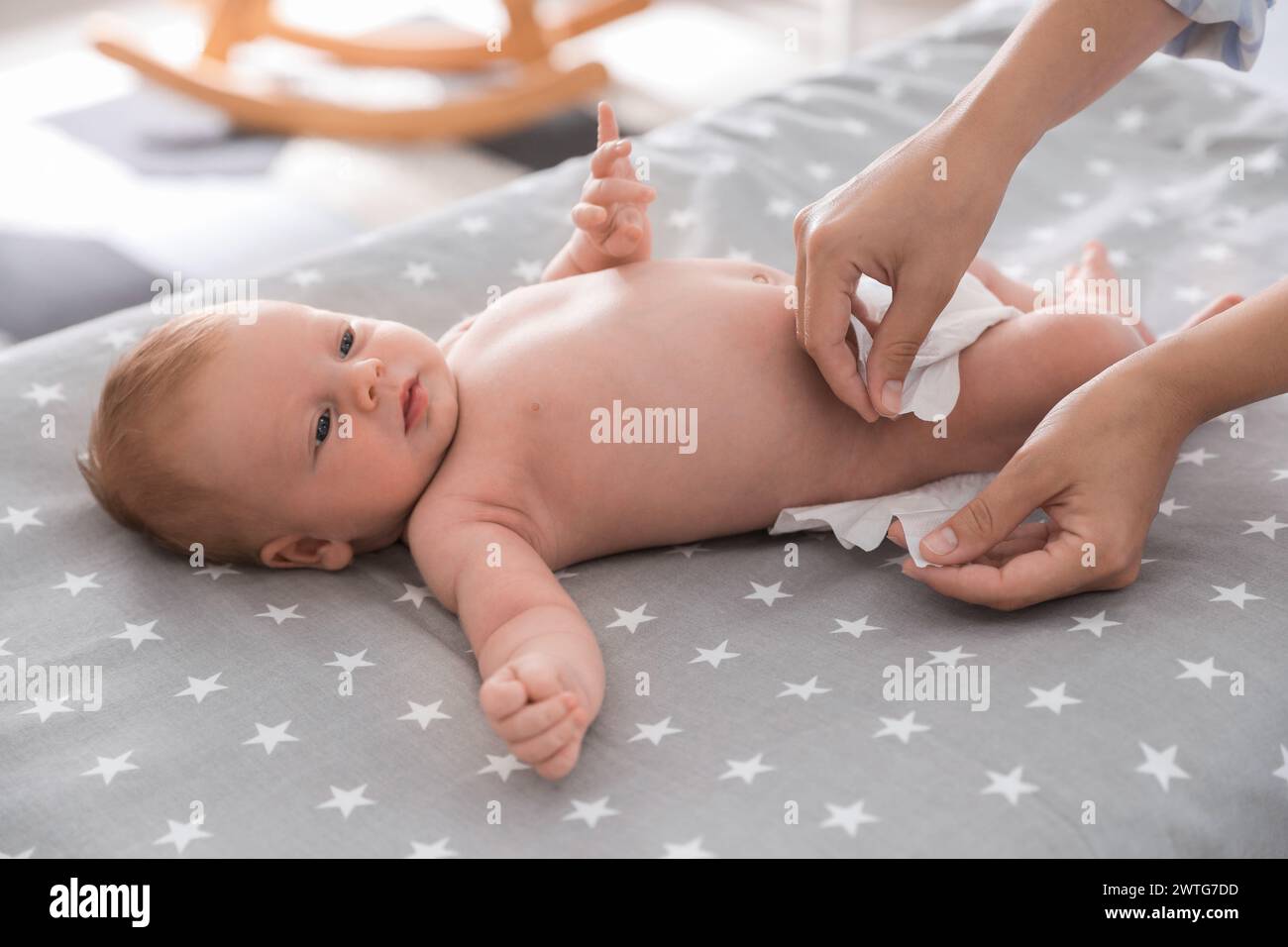 Diaper change mother daughter hi-res stock photography and images - Alamy