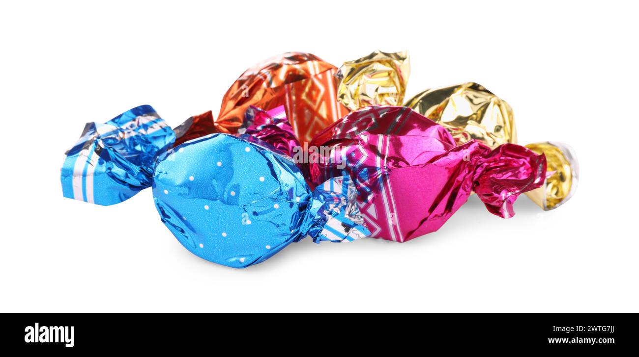 Candies in colorful wrappers isolated on white Stock Photo - Alamy