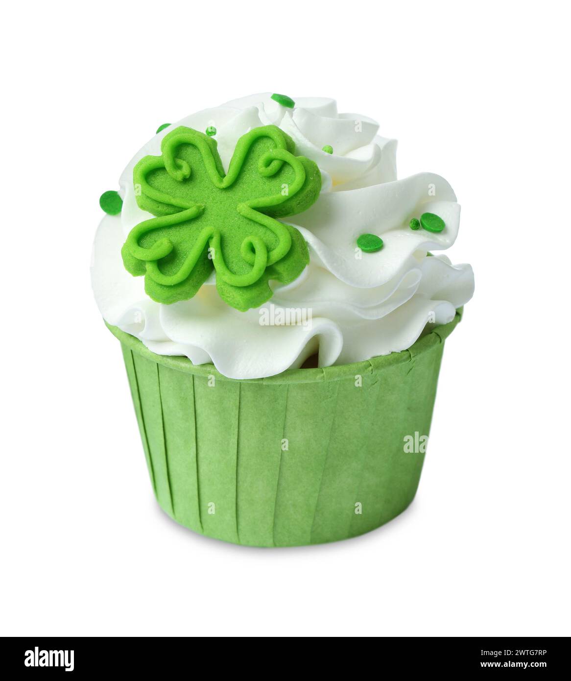 St. Patrick's day party. Tasty cupcake with green clover leaf topper ...