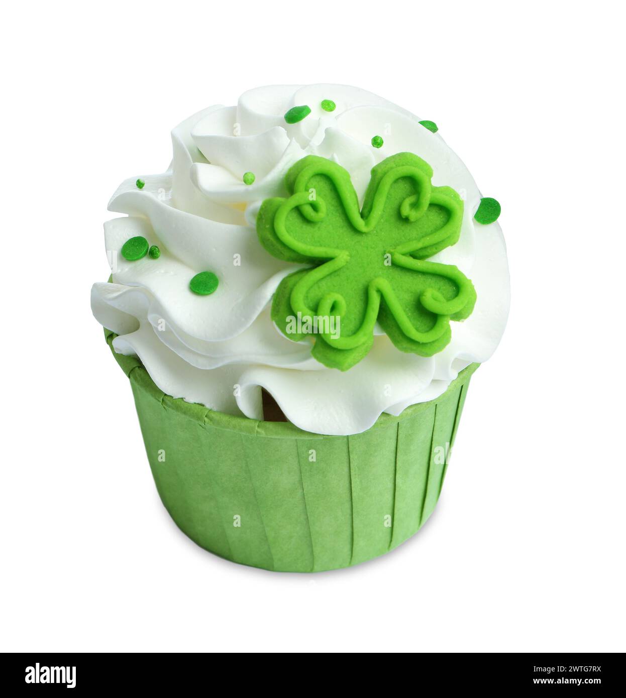 St. Patrick's day party. Tasty cupcake with green clover leaf topper ...