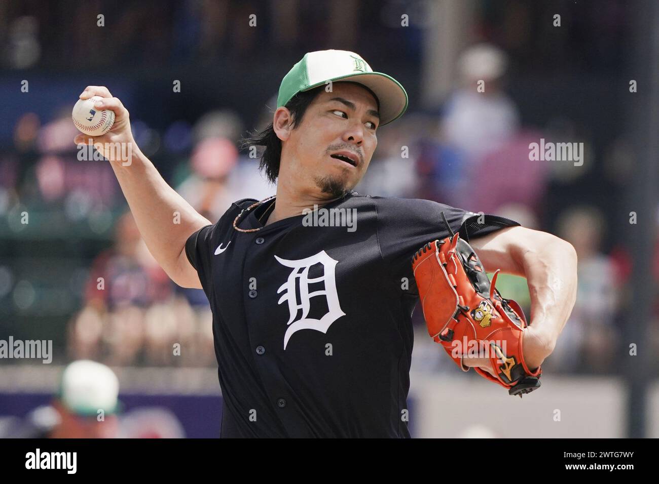 Kenta Maeda of the Detroit Tigers pitches against the Baltimore Orioles in a spring training ...