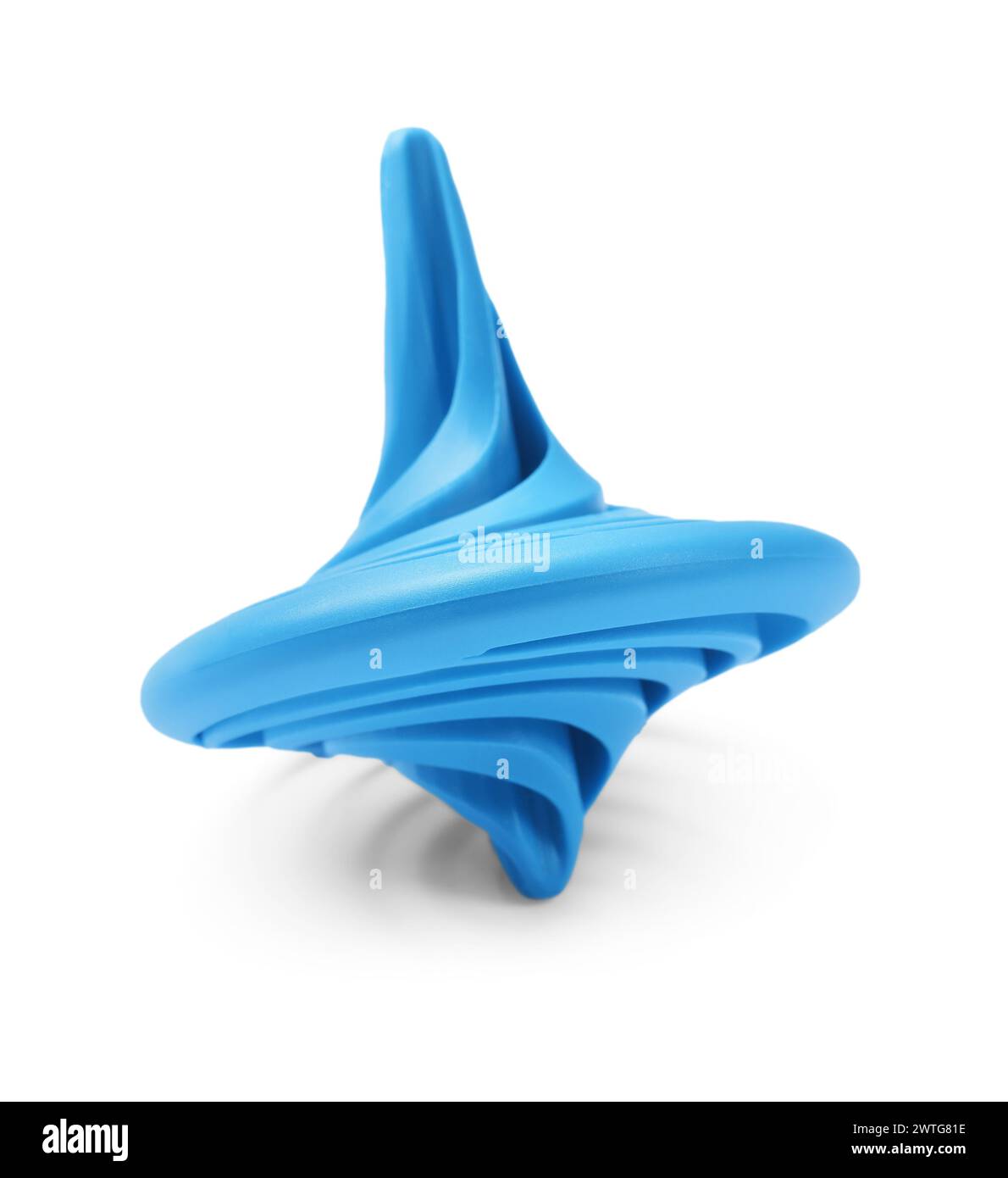 One blue spinning top isolated on white Stock Photo - Alamy