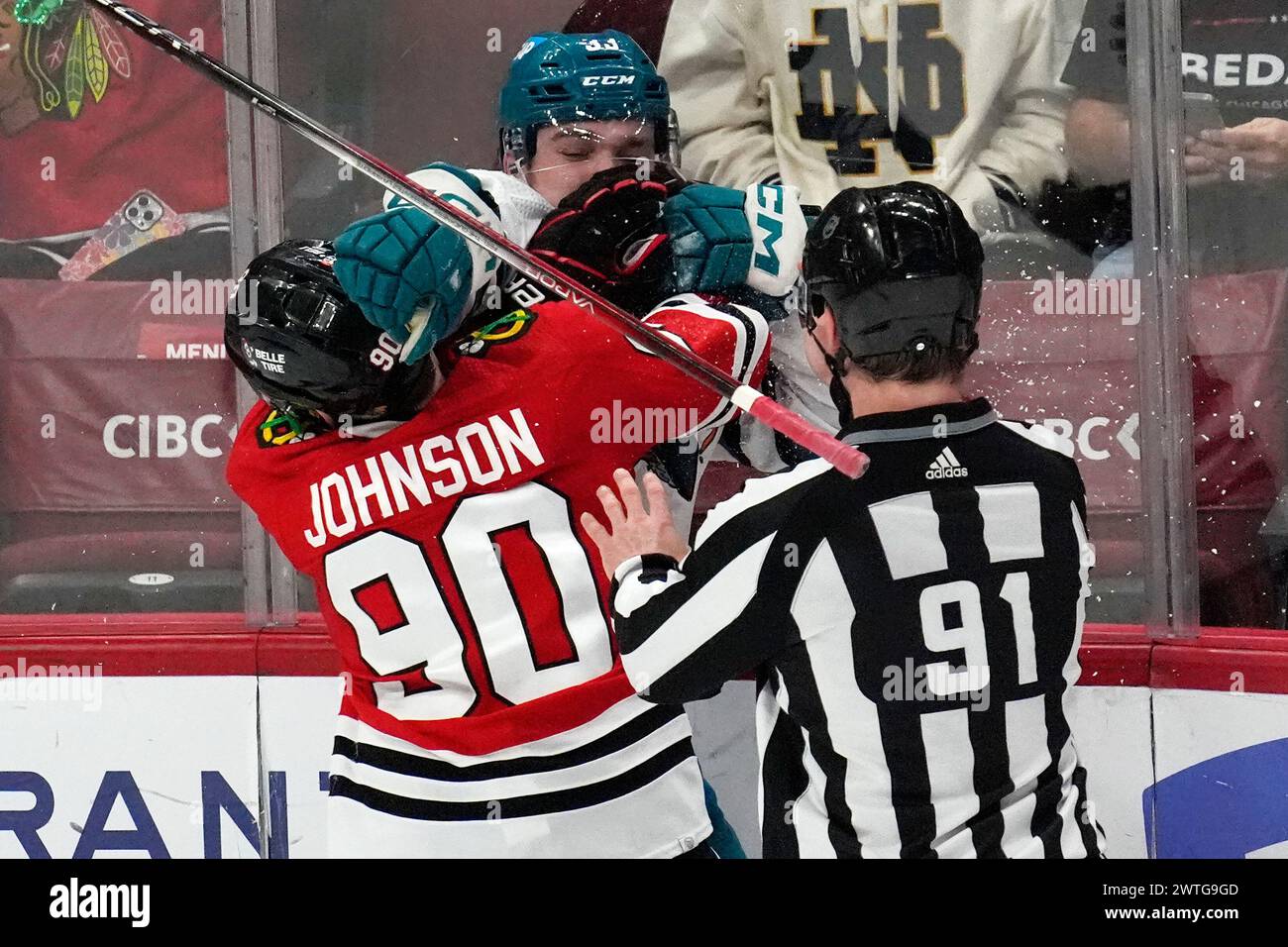 San Jose Sharks defenseman Calen Addison, top, fights with Chicago ...