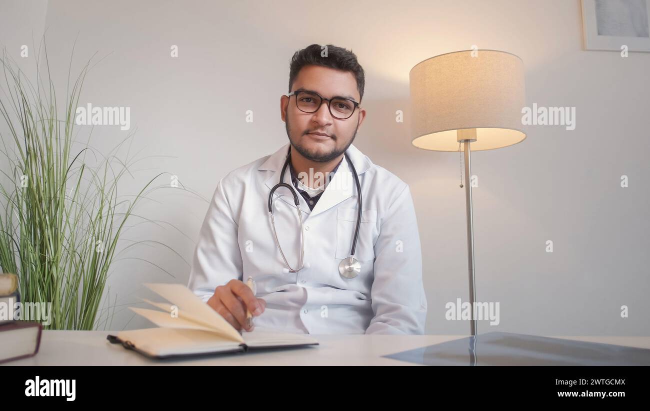 Healthcare professional man doctor clinic office Stock Photo - Alamy