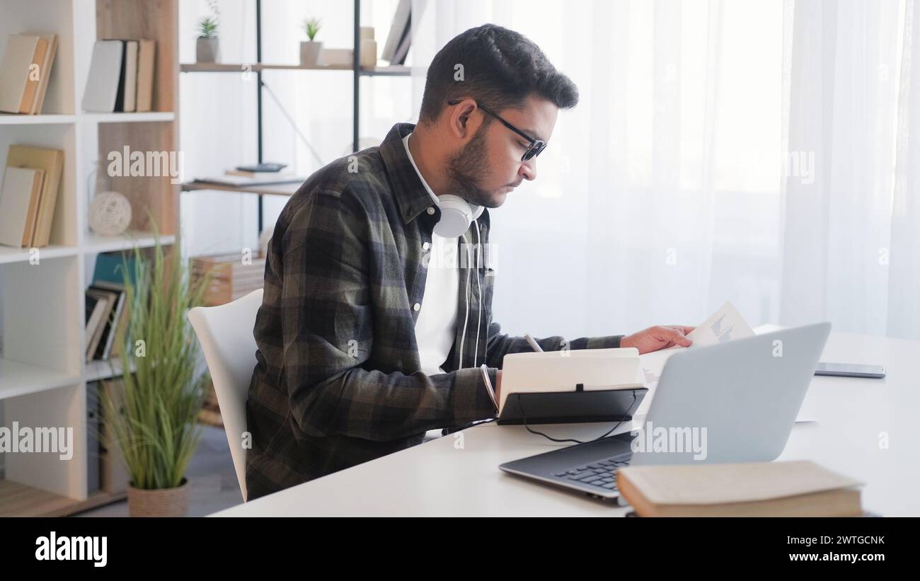 Account manager man documents laptop desk office Stock Photo - Alamy