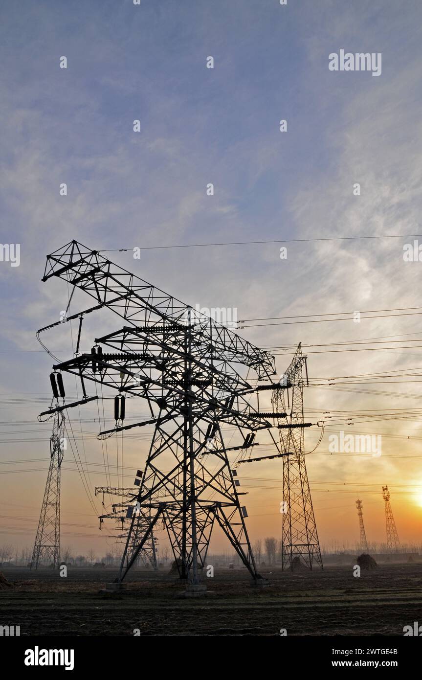 High voltage electric tower line Stock Photo - Alamy