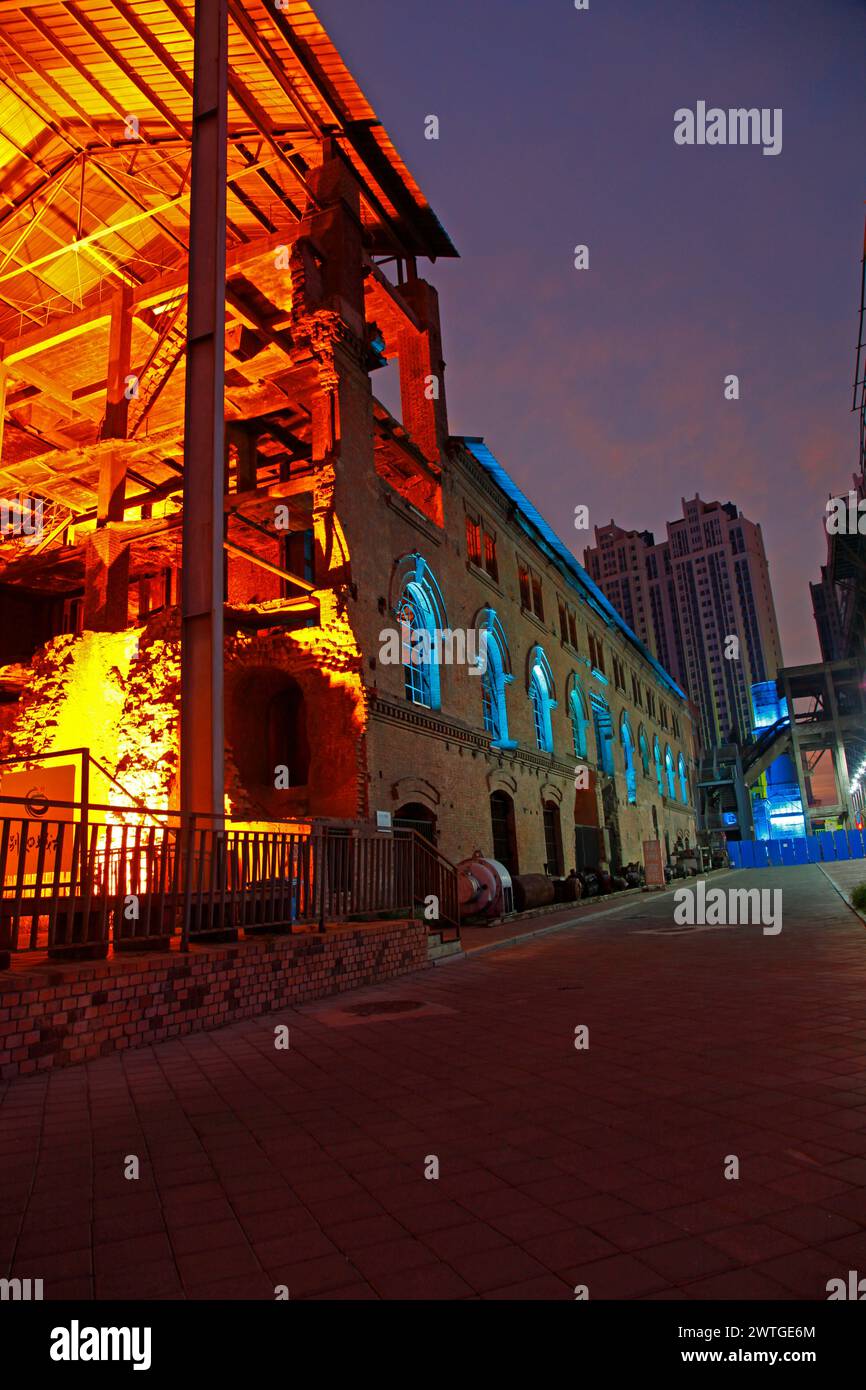 Abandoned factory buildings at night Stock Photo - Alamy