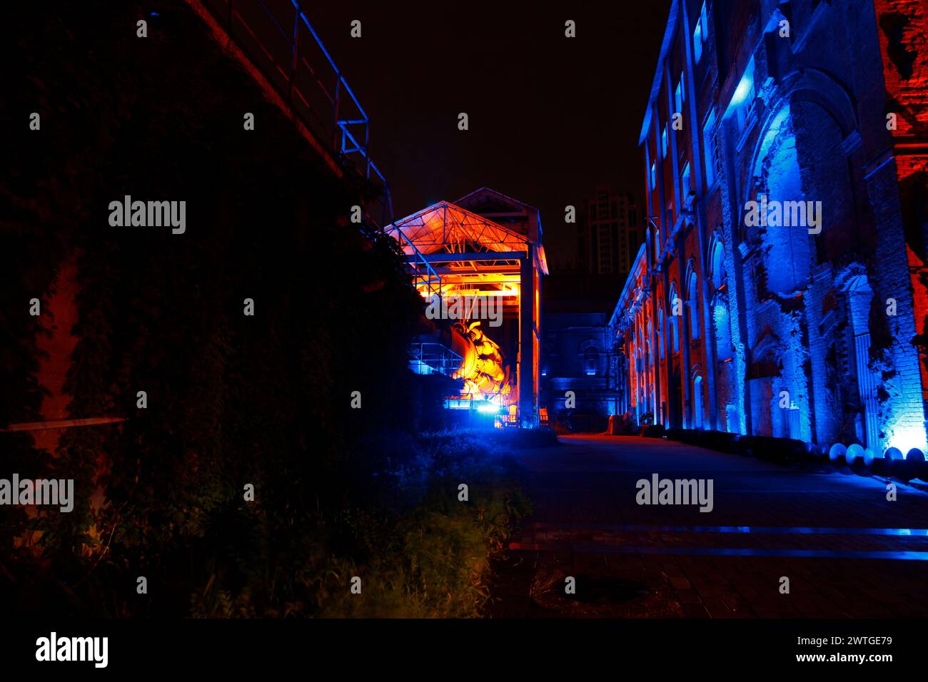 Abandoned factory buildings at night Stock Photo - Alamy