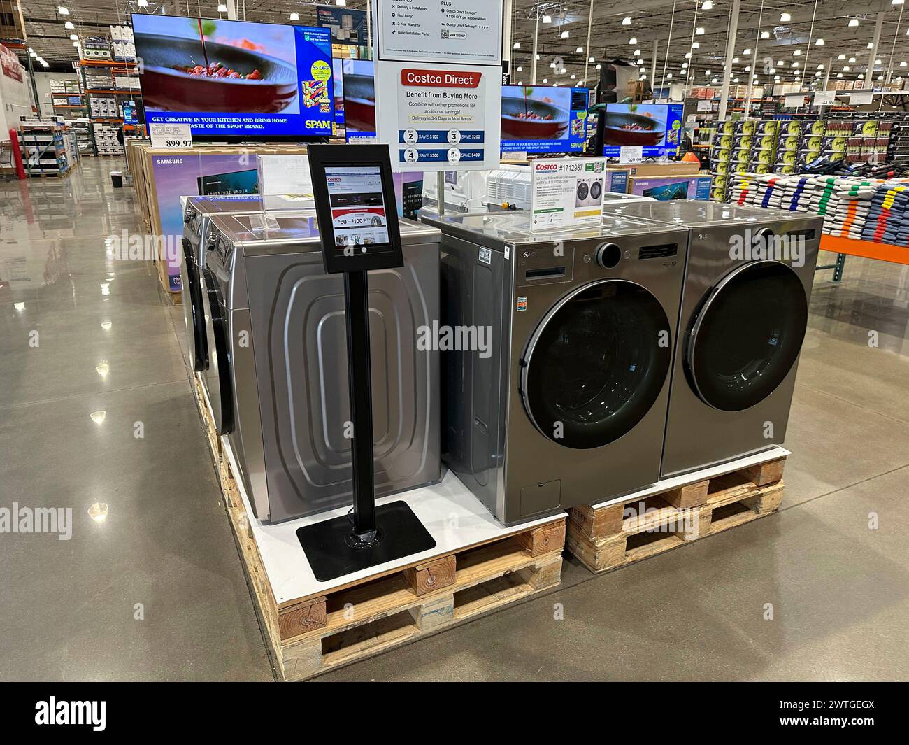 Appliances sit on display in a Costco warehouse Sunday, March 17, 2024 ...