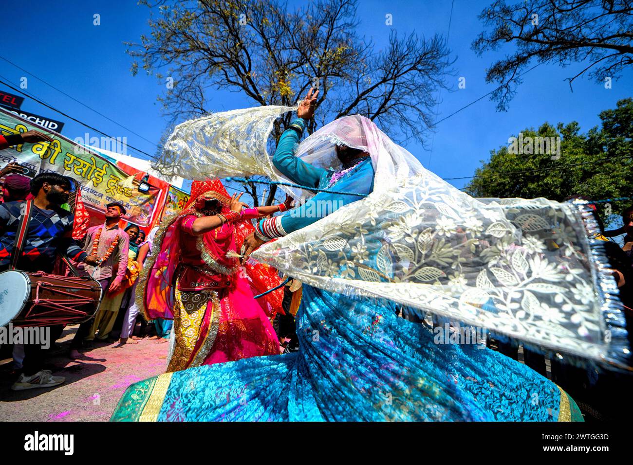 Mathura, India. 17th Mar, 2024. A transgender couple dances during the ...