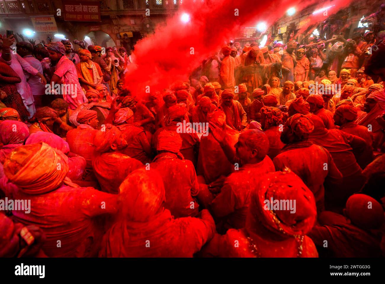 Mathura, India. 17th Mar, 2024. Hindu devotees play with colorful ...