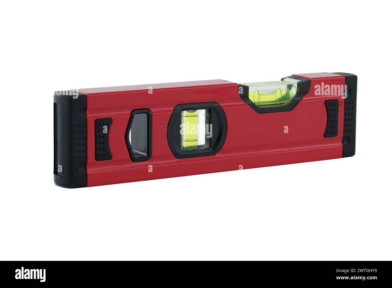 Red spirit level with a green bubble indicator is situated horizontally ...