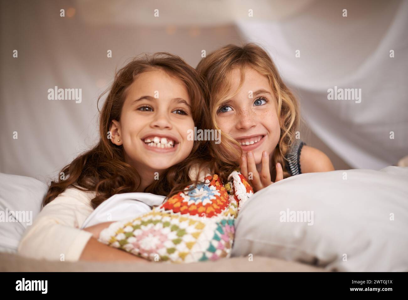 Happy, sleepover and face of children in bedroom for playing, bonding ...