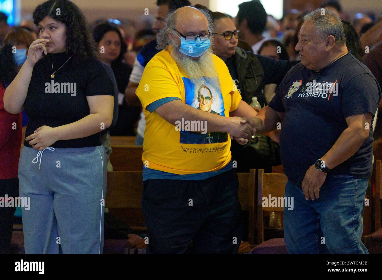 Members of the El Salvadoran community in Los Angeles greet one another ...