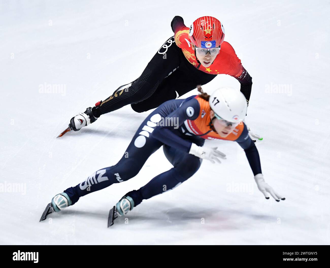 Rotterdam, Netherlands. 17th Mar, 2024. Fan Kexin (top) of Team China ...