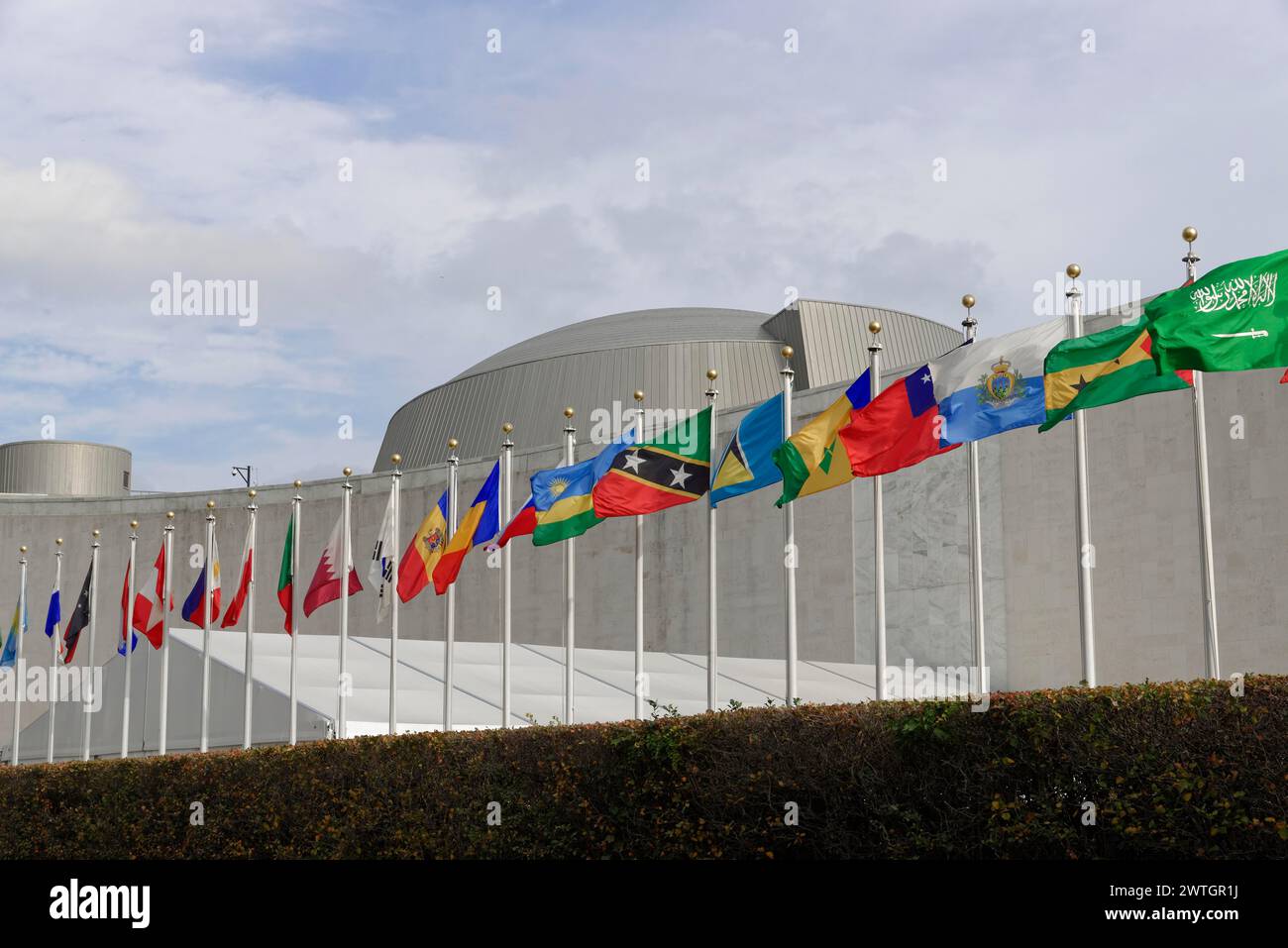 Flags, UN Headquarters, East River, Flags of different nations in front ...
