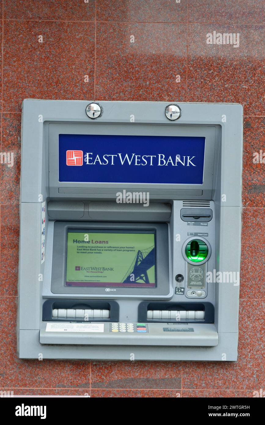 ATM of EastWest Bank with screen and keyboard for transaction ...