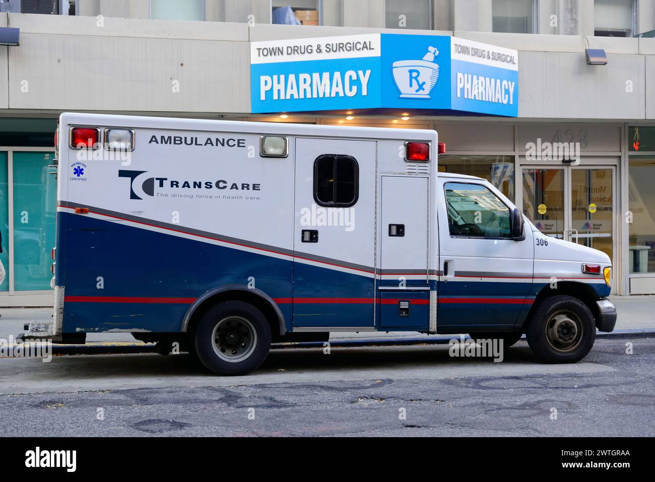 TransCare ambulance parked in front of a pharmacy, Manhattan, New York ...