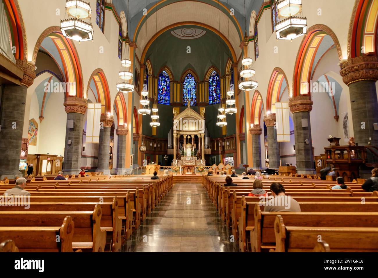 St. Paul the Apostle Church NYC, interior of a church with pews and ...