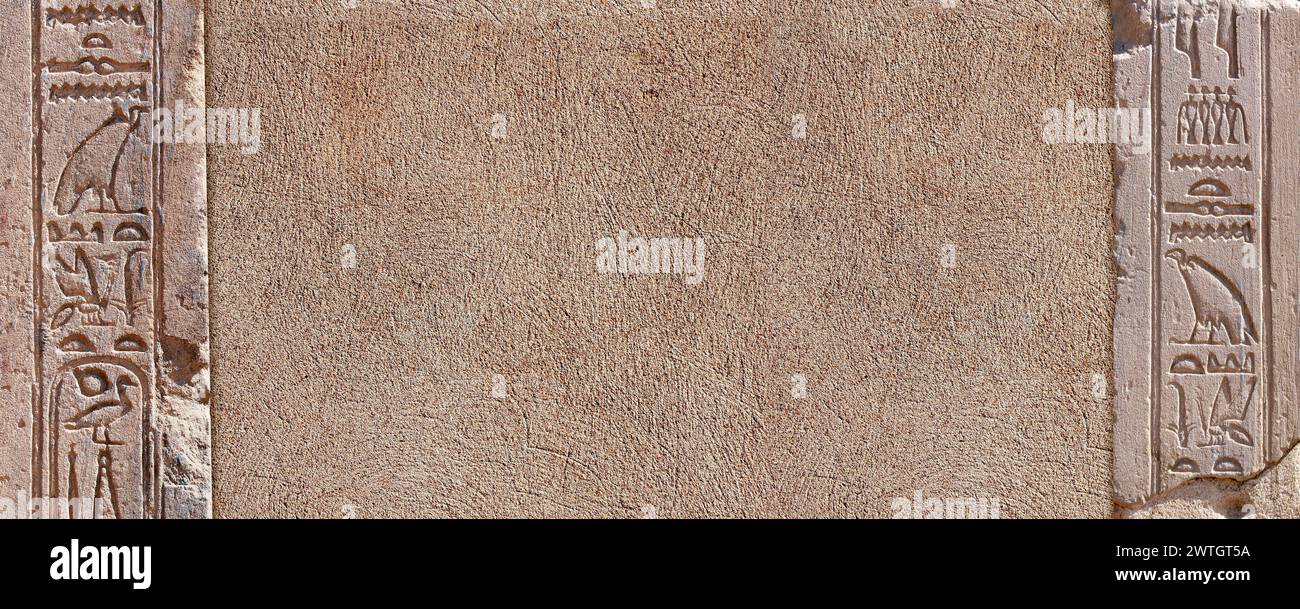 Horizontal background with ancient Egyptian hieroglyphs on stone wall ...