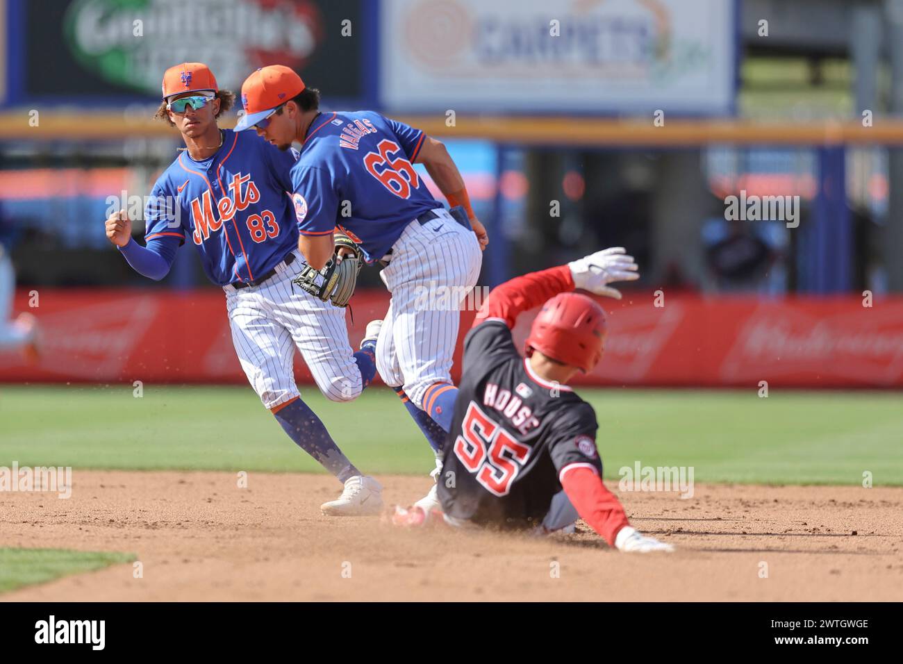 Port St Lucie, FL: New York Mets shortstop Jeremy Rodriguez (83) fields ...
