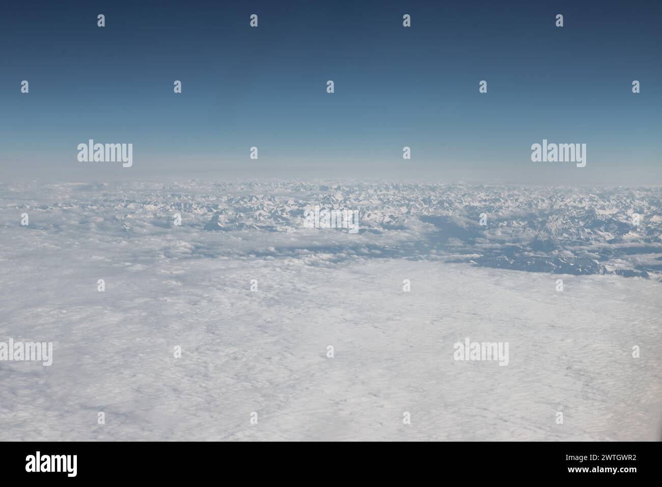 An aerial view of the Alps, a European mountain range and also the ...
