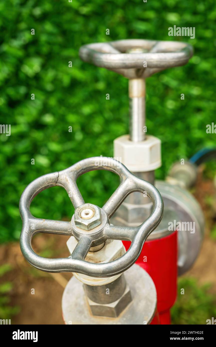 Water hydrant gate valve on street, selective focus Stock Photo - Alamy