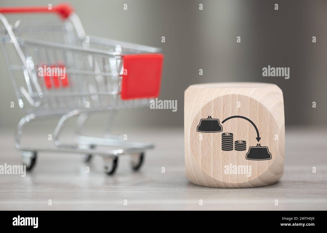 Wooden block with symbol of money transfer concept and trolley on ...