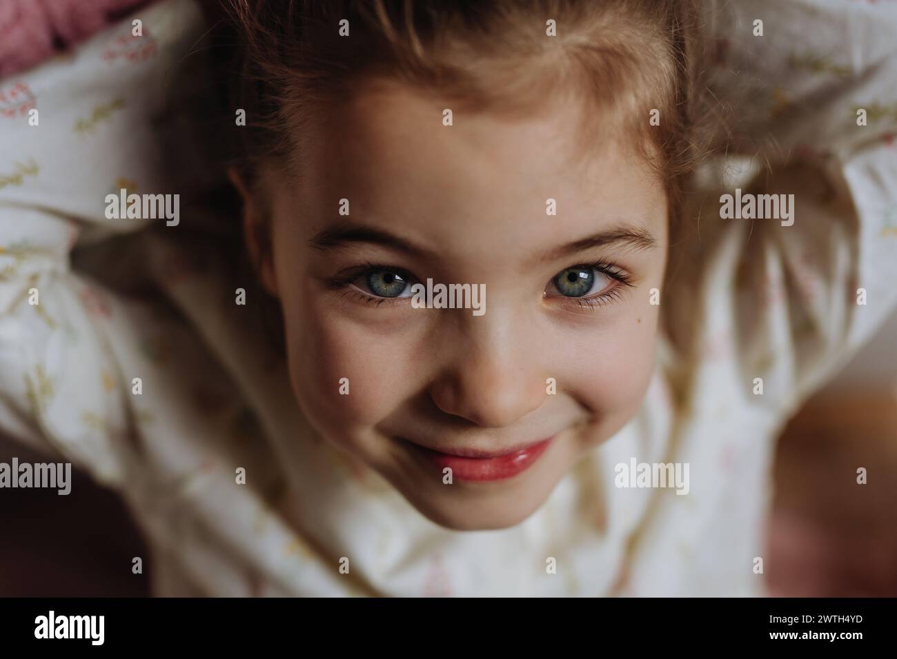 Top view portrait of little girl, charming young lady with beautiful ...