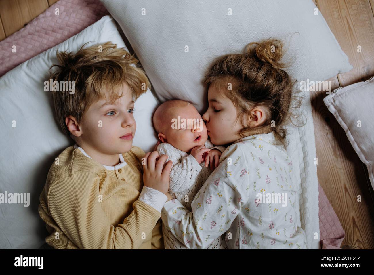 Family Cuddling Free Stock Photo Of Close Knit Family Sharing A Moment