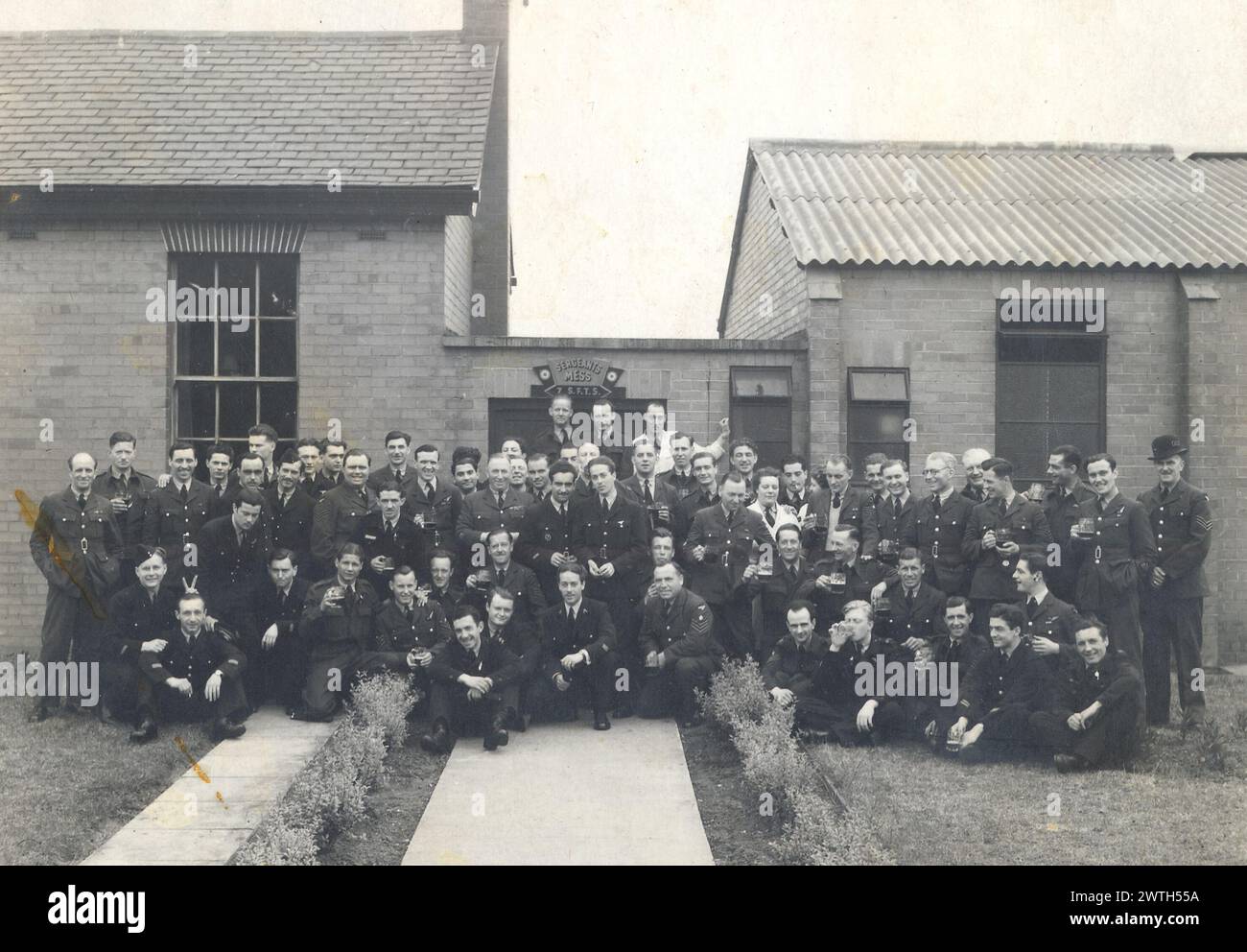 7 S.F.T.S Sergeants Mess, RAF. Group photograph taken outside. Showing ...