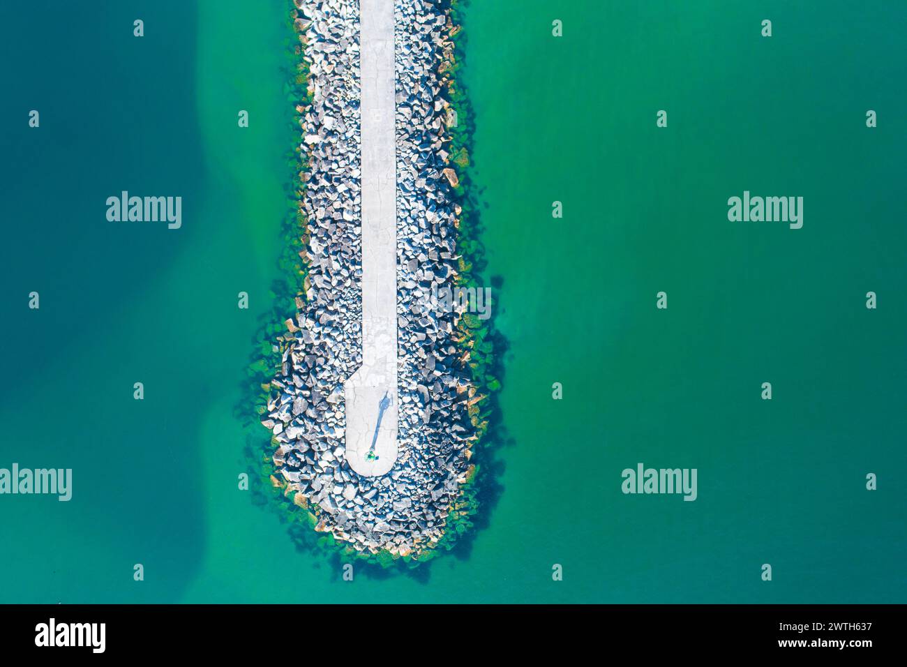 drone aerial view of the protective barrier of a harbor, zenithal image ...