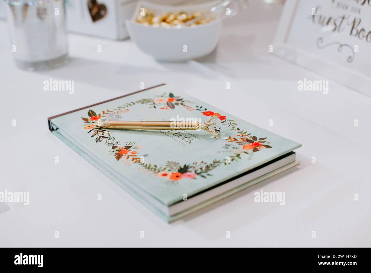 wedding guest signing book journal Stock Photo - Alamy