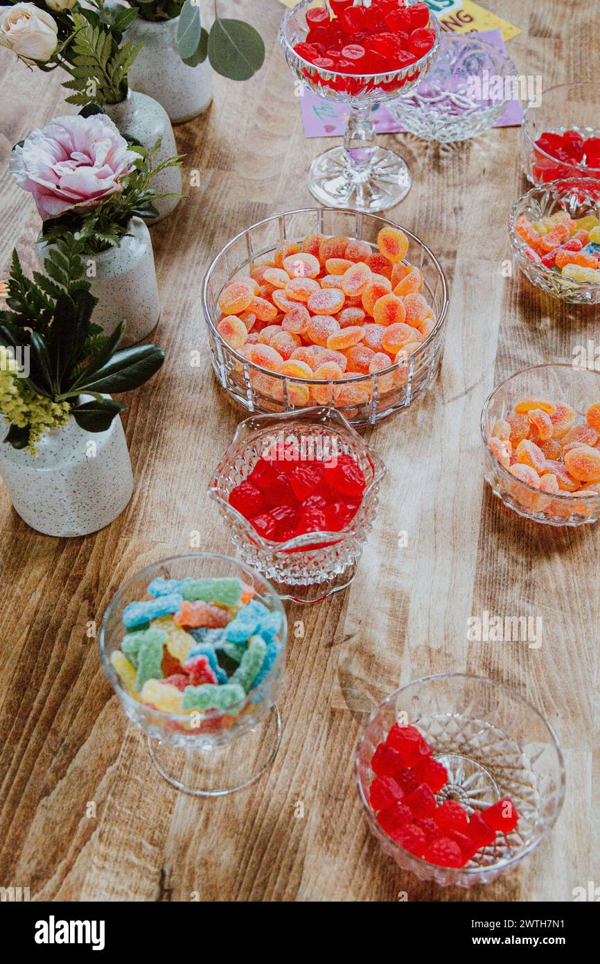wedding candy display table during reception Stock Photo - Alamy