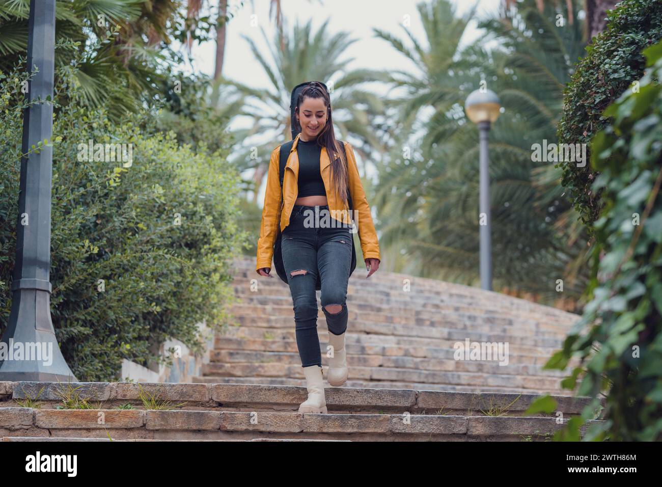 Young woman guitar in park hi-res stock photography and images - Alamy