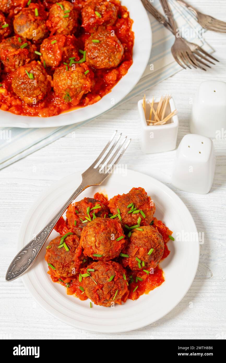 Albondigas, spanish meatballs of pork and beef blend in tomato red ...