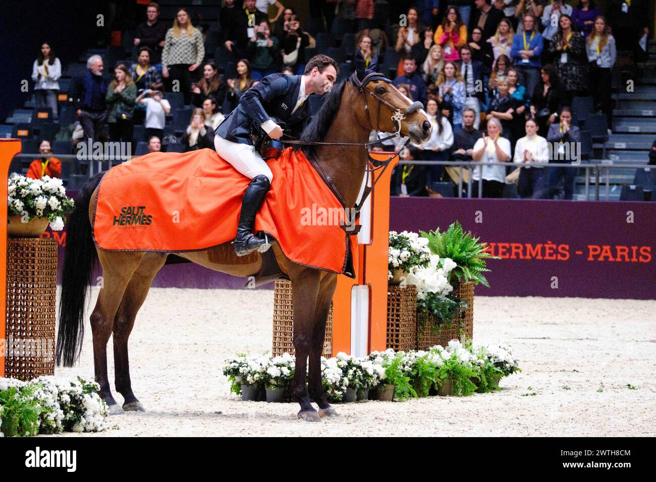 Paris, France. 17th Mar, 2024. Julien ANQUETIN (FRA) riding BLOOD ...