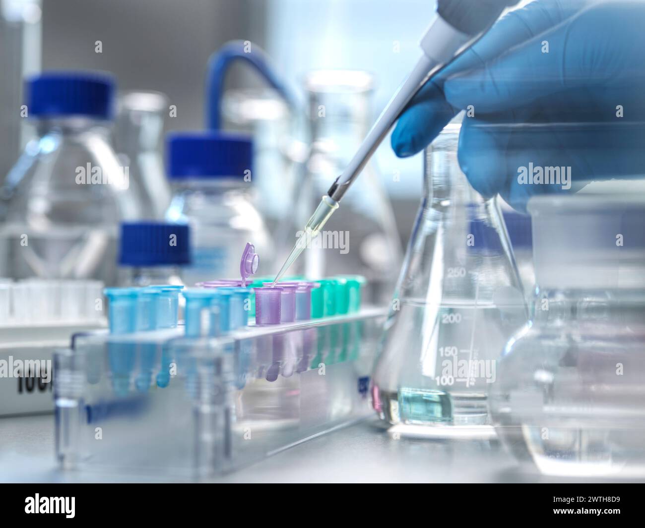Genomics, Scientist extracting a sample ready for analysis Stock Photo ...