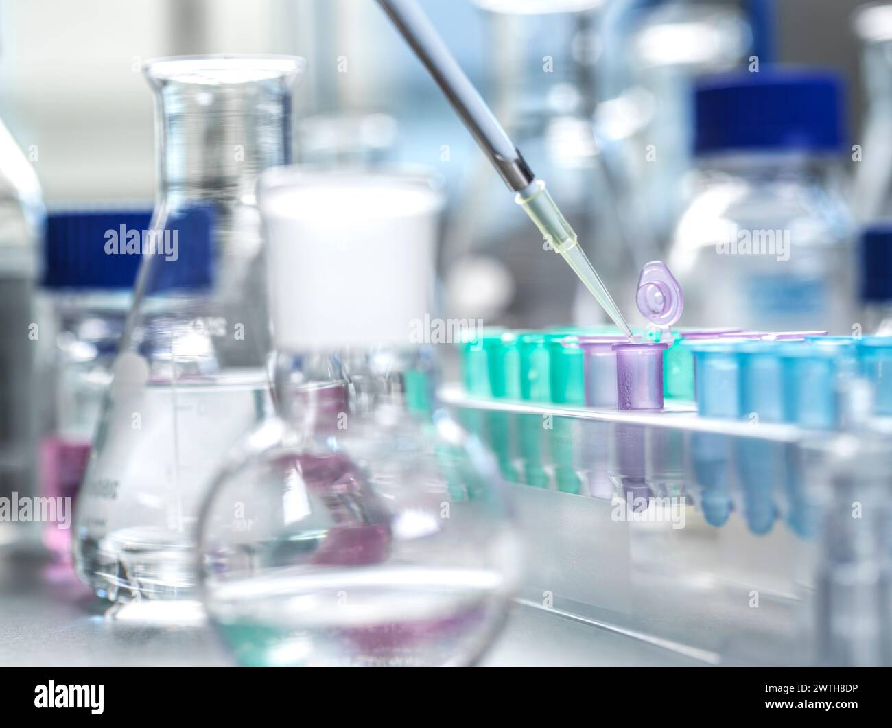 Genomics, Sample being extracted from a vial Stock Photo - Alamy