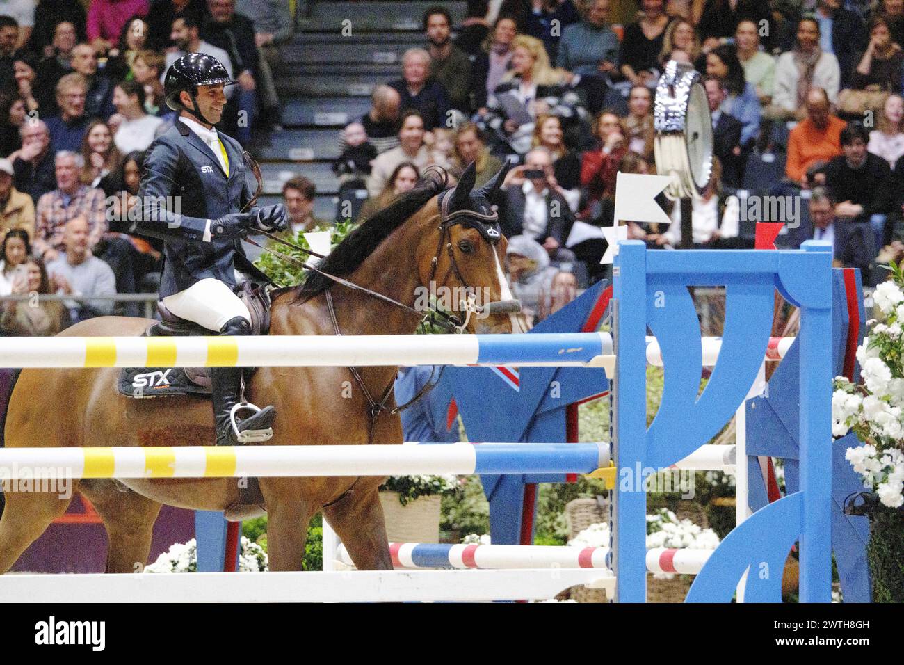 Paris, France. 17th Mar, 2024. Julien ANQUETIN (FRA) riding BLOOD ...