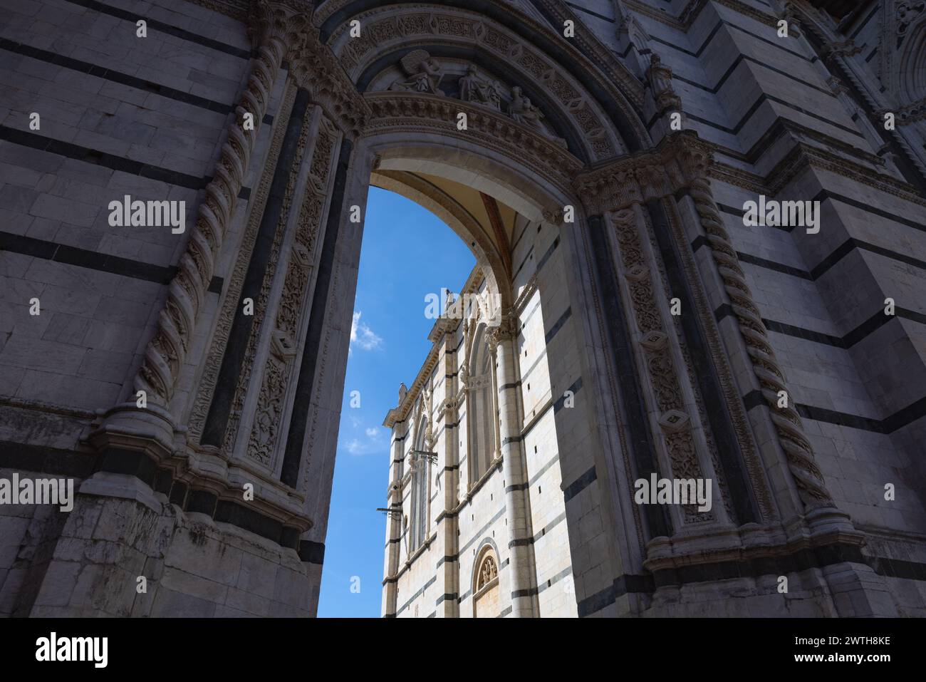Huge gate to the square with cathedral of Siena, Tuscany, Italy Stock ...